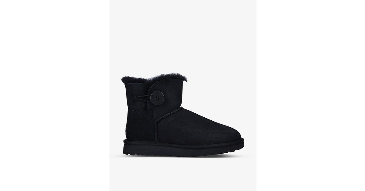 UGG Mini Bailey Button Ii Suede And Sheepskin Ankle Boots in Black ...