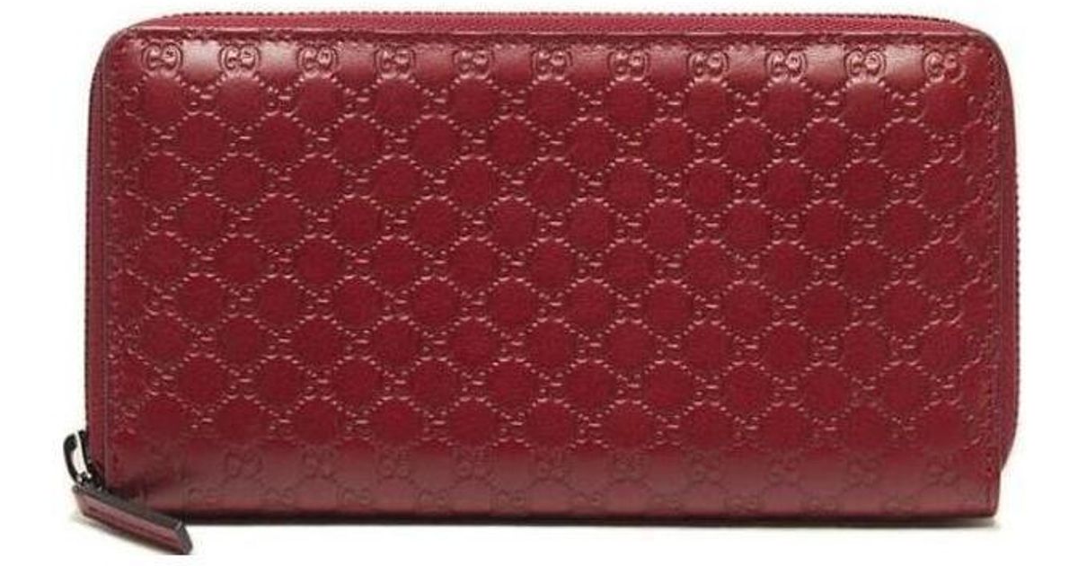 Gucci Logo Embossed Wallet in Red | Lyst