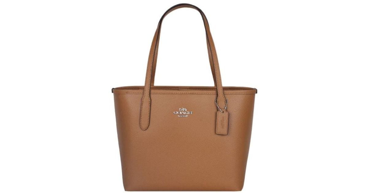 COACH Logo Decal Handbag in Brown | Lyst