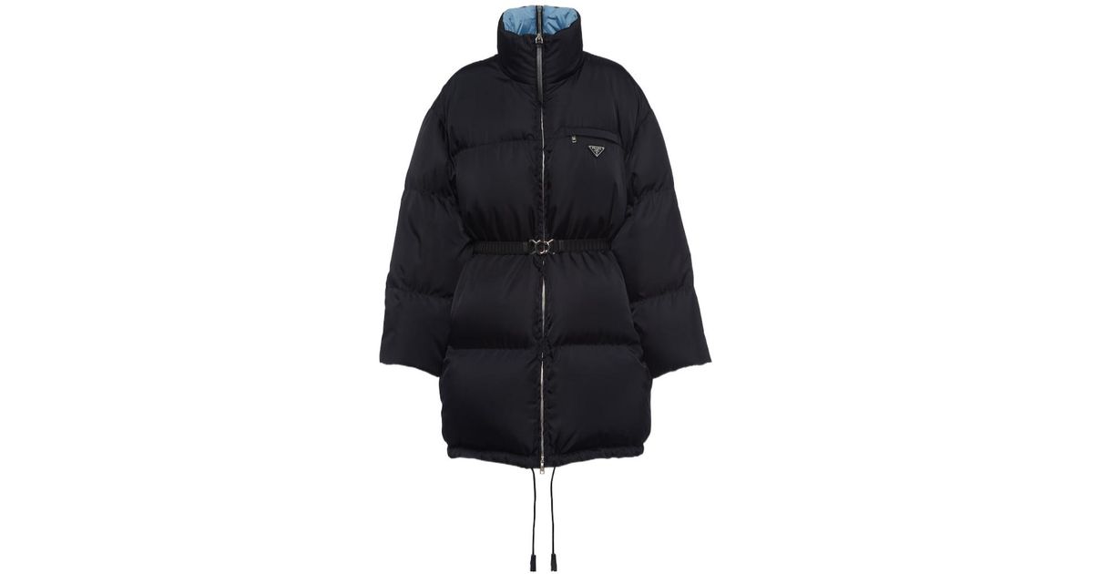 Prada Re-Nylon Belted Puffer Coat in Blue | Lyst