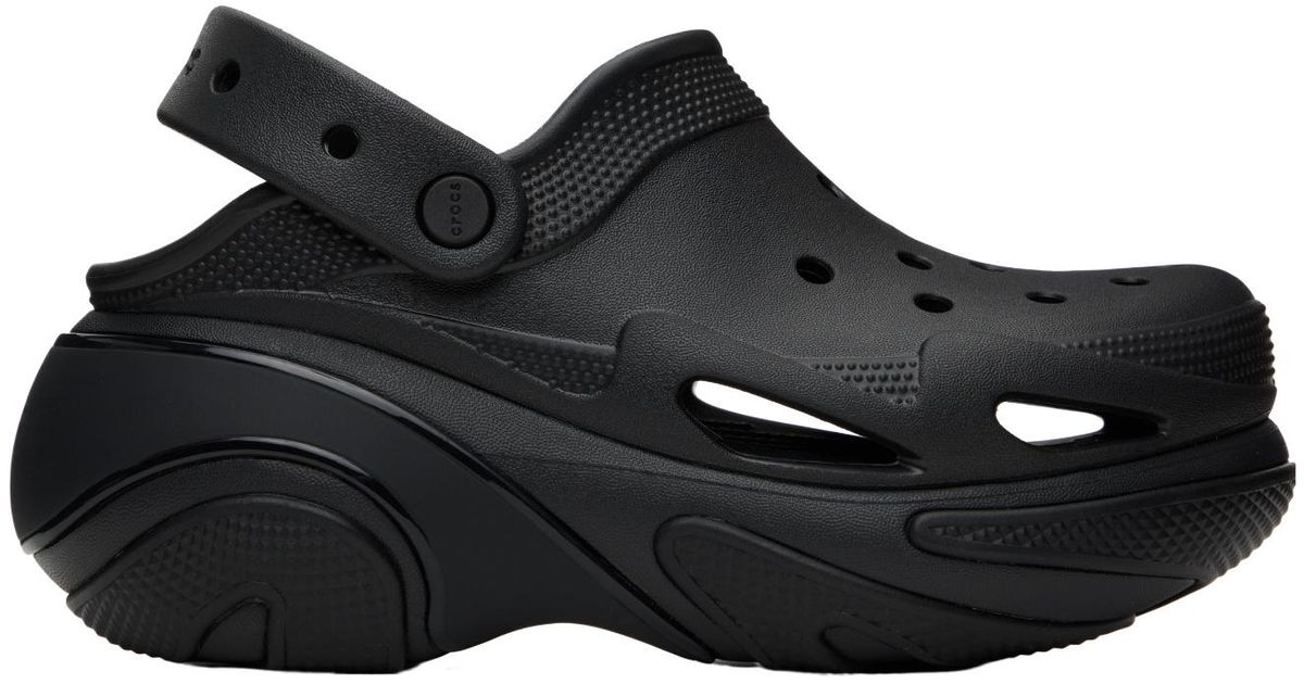 Crocs™ Round Toe Flat Sandals in Black | Lyst