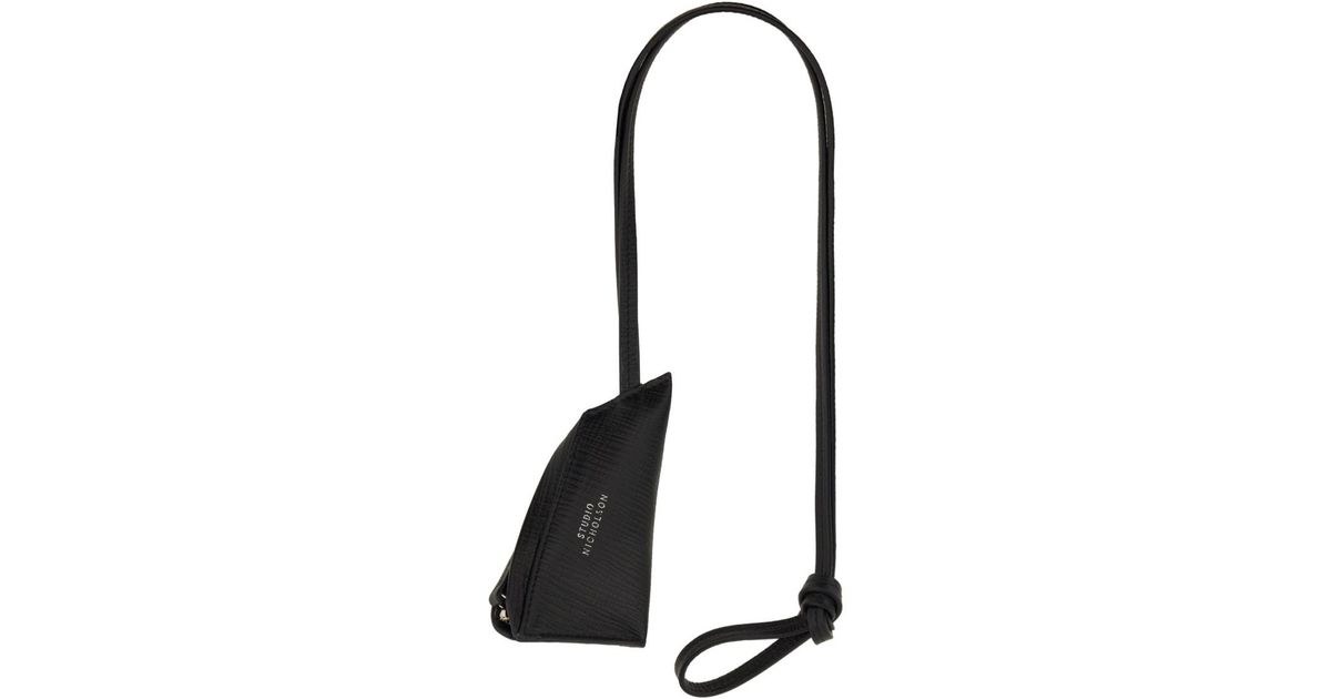 Studio Nicholson Minimalist Sling Bag in Black | Lyst