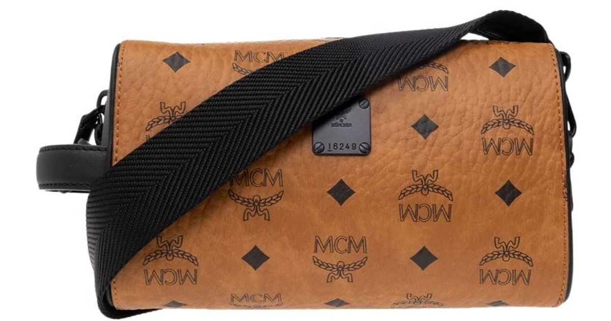 MCM Ottomar Logo-Print Clutch Bag in Brown | Lyst