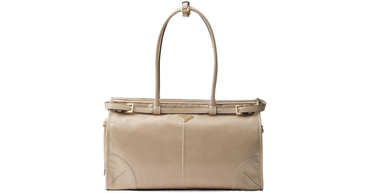 Prada Large Enamel Triangle Logo Belted Handbag in Natural | Lyst