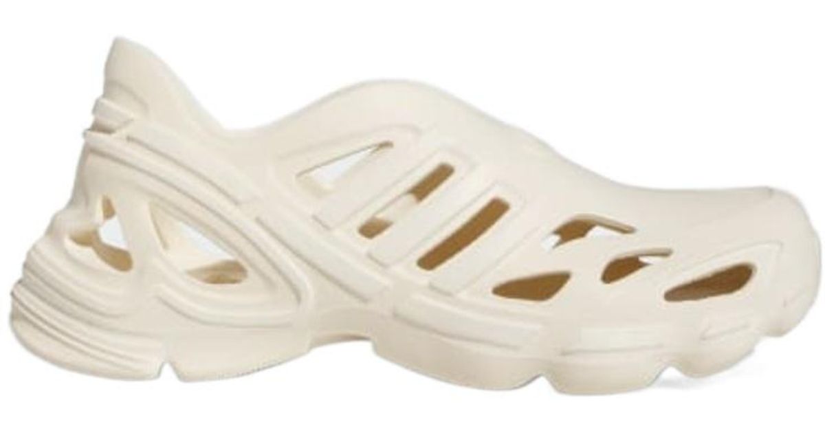 adidas Originals Logo-Embossed Perforated-Design Sneakers in Natural | Lyst