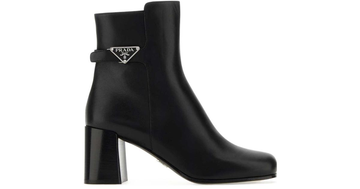 Prada Triangle-Plaque Ankle Boots in Black | Lyst