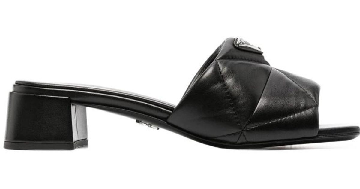 Prada Triangle Logo Quilted Mules in Black | Lyst