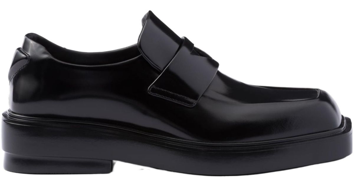 Prada Triangle-Patch Leather Loafers in Black | Lyst