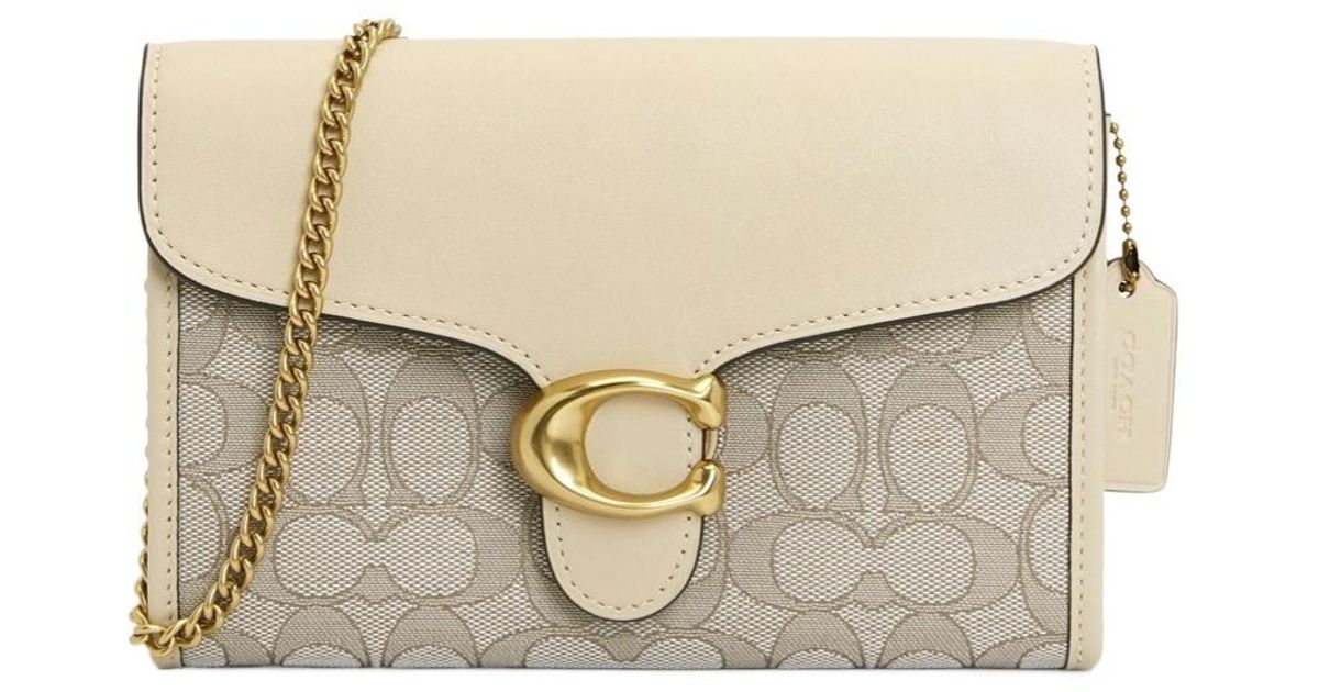 COACH Flip Shoulder Bag in Natural | Lyst