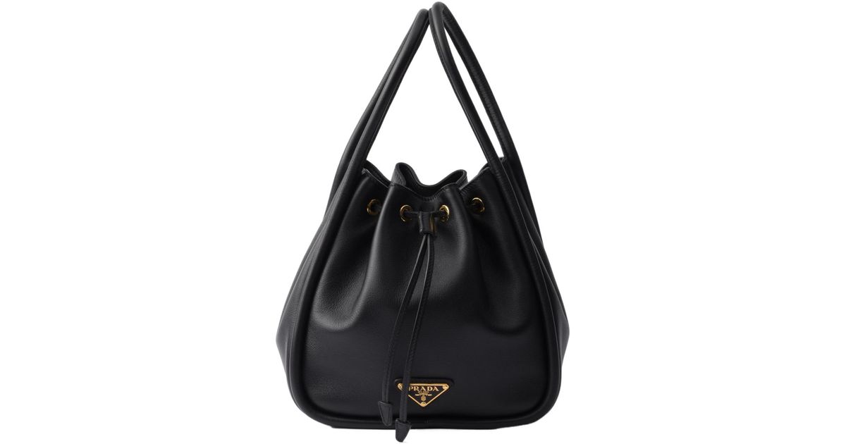 Prada Triangle-Logo Drawstring Bucket Bag in Black | Lyst