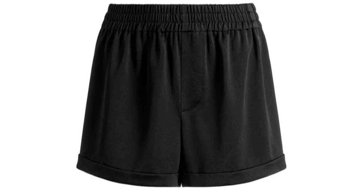 Alice + Olivia Richie Low-Rise Cuffed Boxers in Black | Lyst