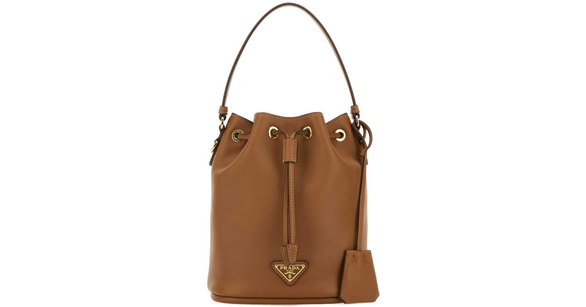 Prada Logo Bucket Bag in Brown | Lyst