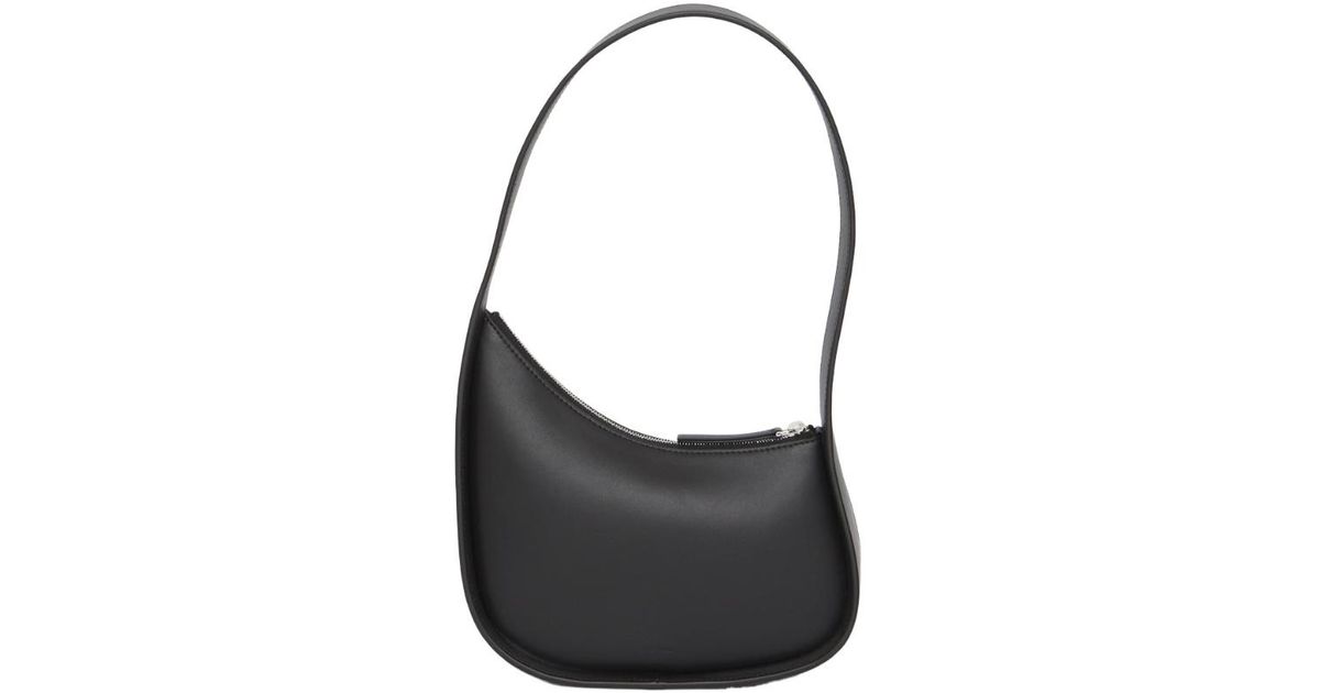 The Row Half Moon Bag in Black | Lyst