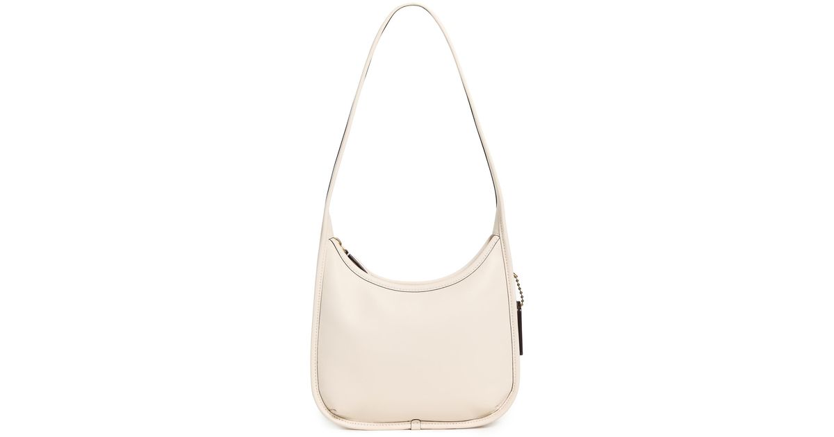 COACH Glovetanned Leather Curve Zip Bag in White | Lyst