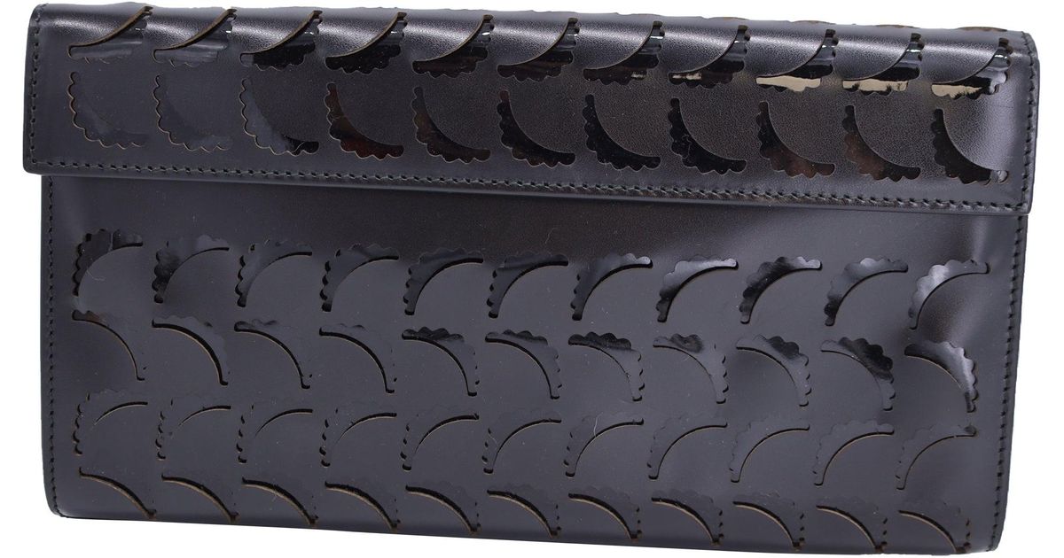 Alaïa Laser Cut Flap Clutch in Blue | Lyst