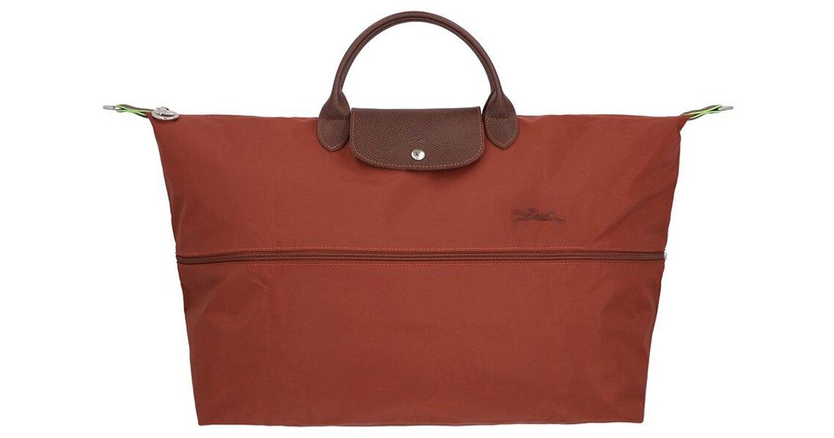Longchamp Le Pliage Expandable Canvas Travel Bag in Red | Lyst