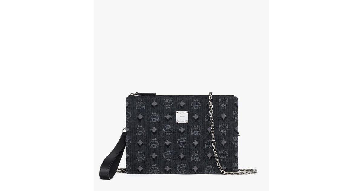 MCM Aren Flat Pouch in Black | Lyst