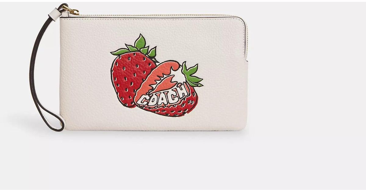 COACH Large Corner Zip Wristlet With Strawberry Graphic in Pink | Lyst
