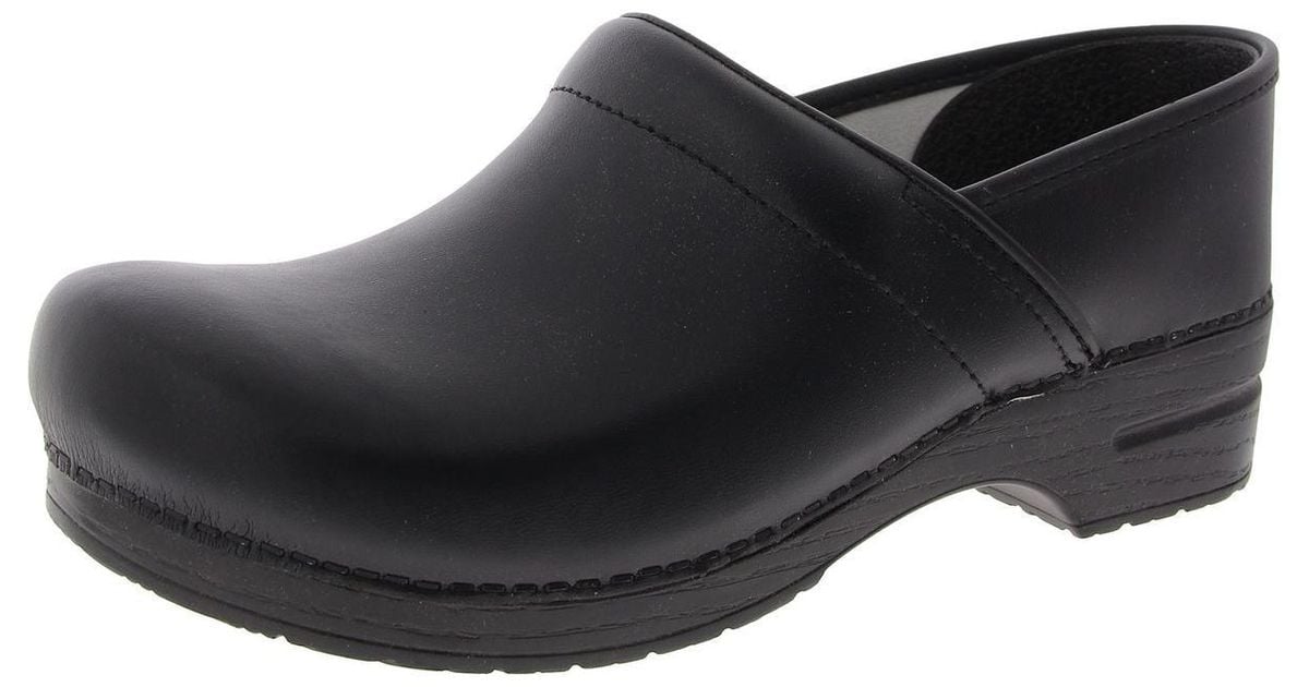 Dansko Solid Clogs in Black | Lyst