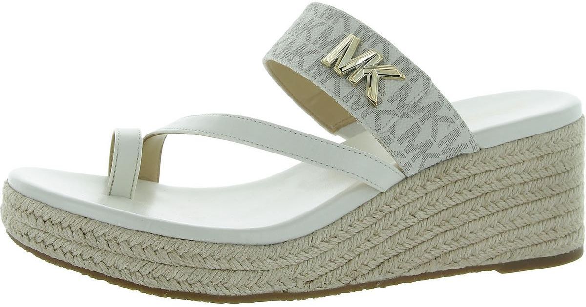 MICHAEL Michael Kors Jilly Mid Wedge Logo Wedge Thong Sandals in ...