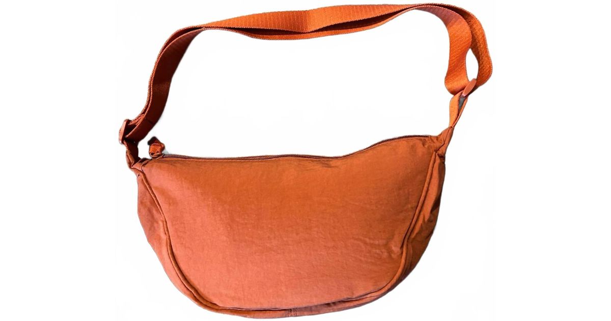 Jillian Ink Nylon Crescent Crossbody Bag Rust in Orange | Lyst