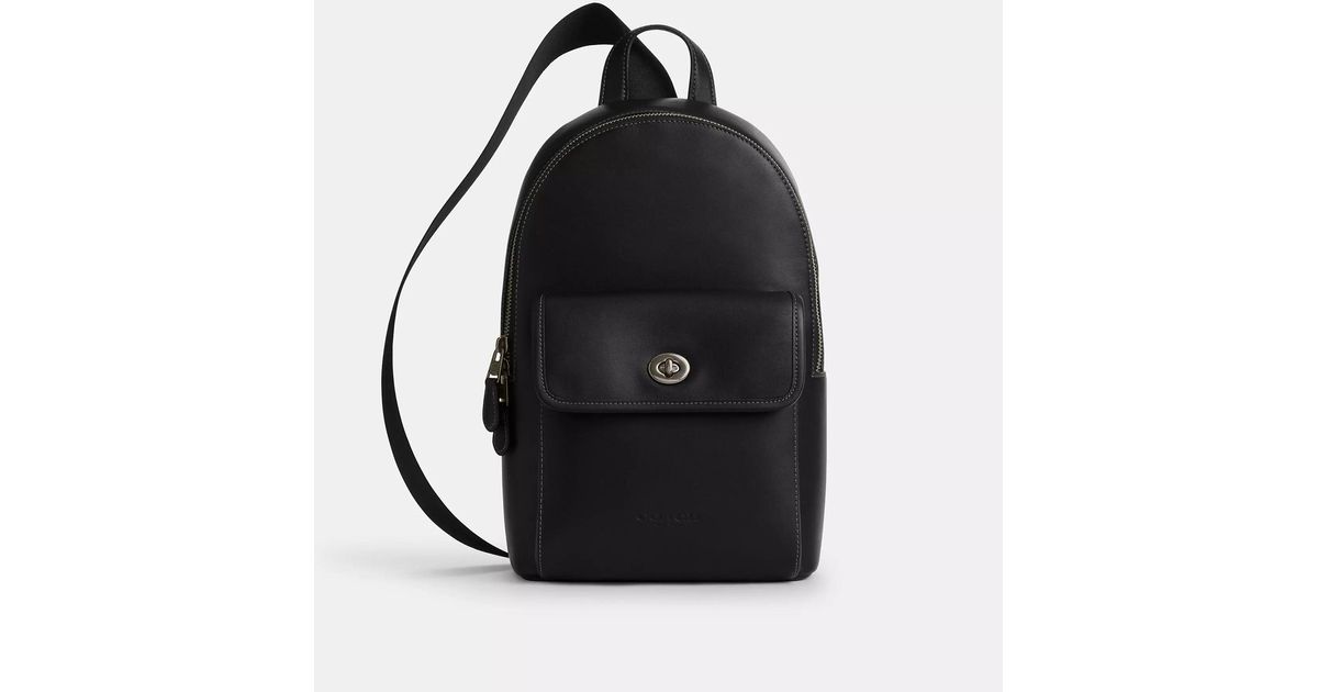 COACH Turnlock Sling Pack in Black | Lyst
