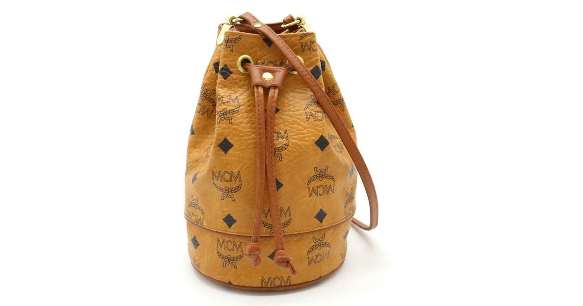 MCM Visetos Logo Drawstring Shoulder Bag in Brown | Lyst