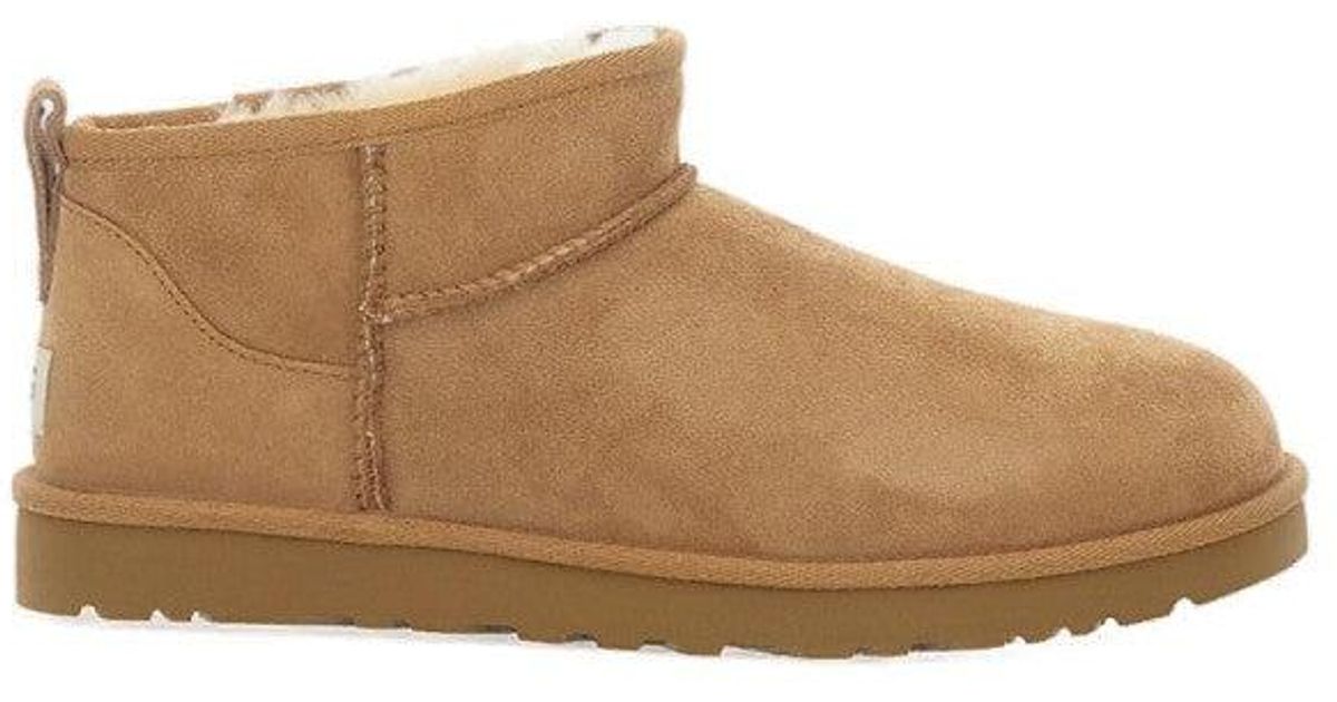 UGG Ultra Mini Shearling-Lined Boots With Stitched Detailing in Brown ...