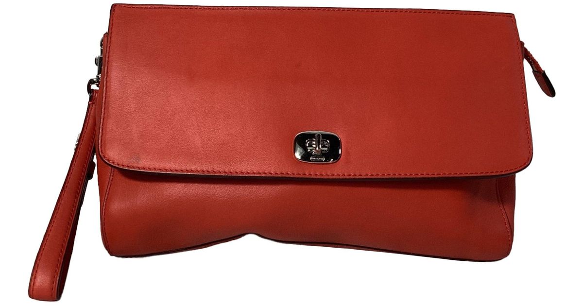 COACH Twist Lock Clutch Bag in Red | Lyst