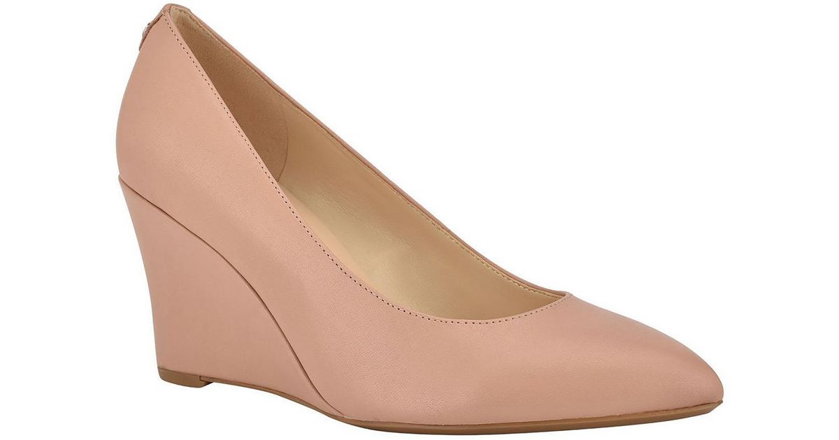 Nine West Cal 9X9 Leather Slip On Wedge Heels in Natural | Lyst