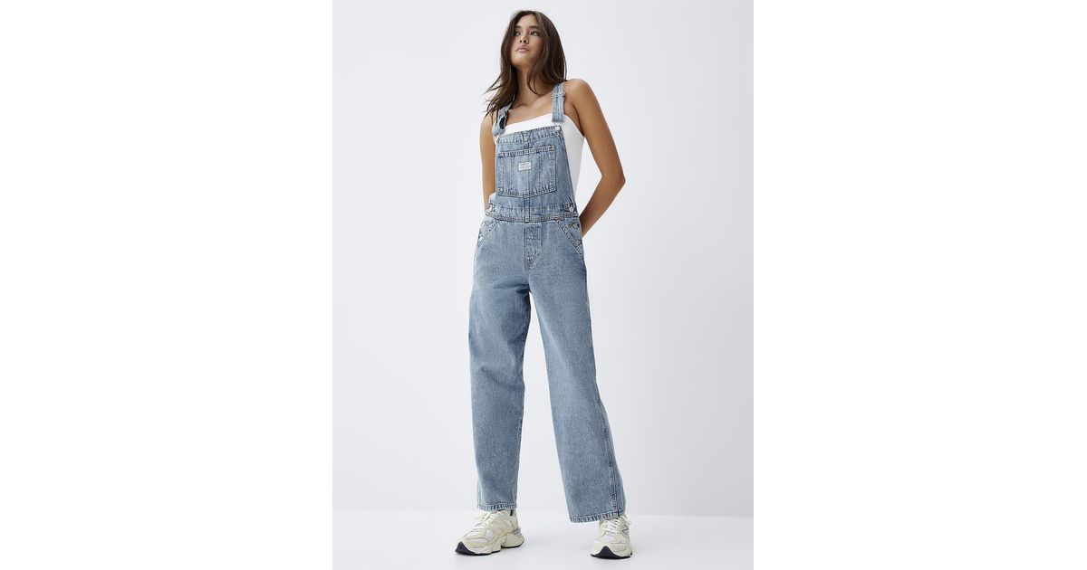 Levi's Faded Blue Denim Loose Overalls | Lyst