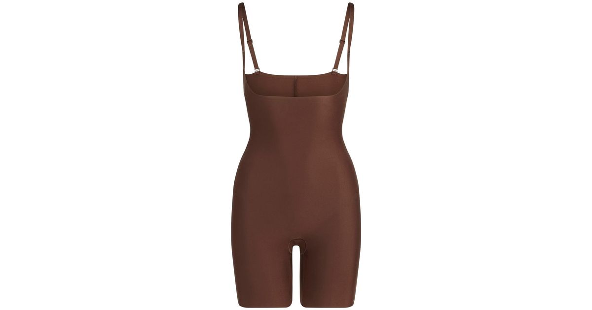 Skims Core Sculpt Open Bust Mid Thigh Bodysuit In Brown Lyst