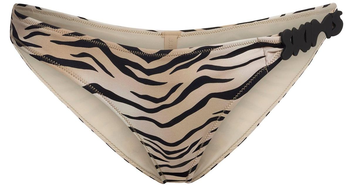 Skims Logo Bikini Bottom in White | Lyst