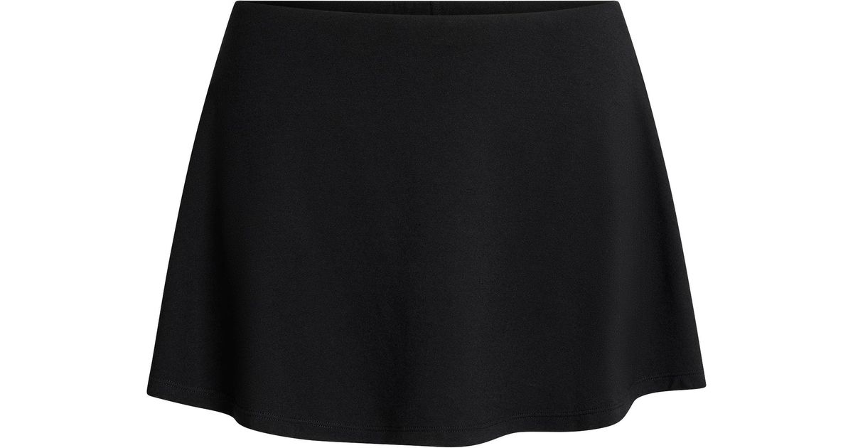 Skims Mini Skort in Black | Lyst