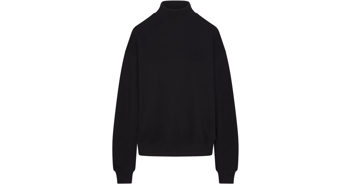 Skims Oversized Mock Neck Pullover in Black | Lyst