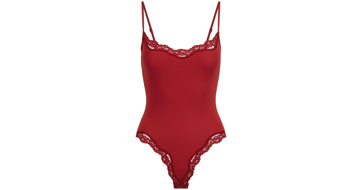 Skims Cami Bodysuit in Red | Lyst