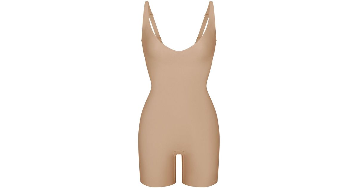 Skims Core Sculpt Plunge Mid Thigh Bodysuit in White | Lyst