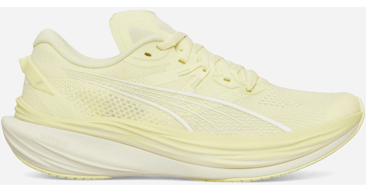 PUMA Women S Deviate Nitro 3 Sneakers Gold Moon / Alpine in Yellow | Lyst