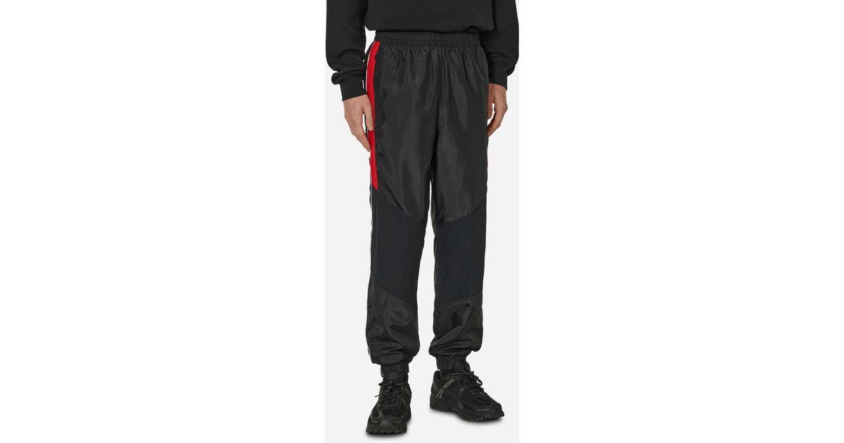 Nike Air Woven Pants University in Black for Men | Lyst