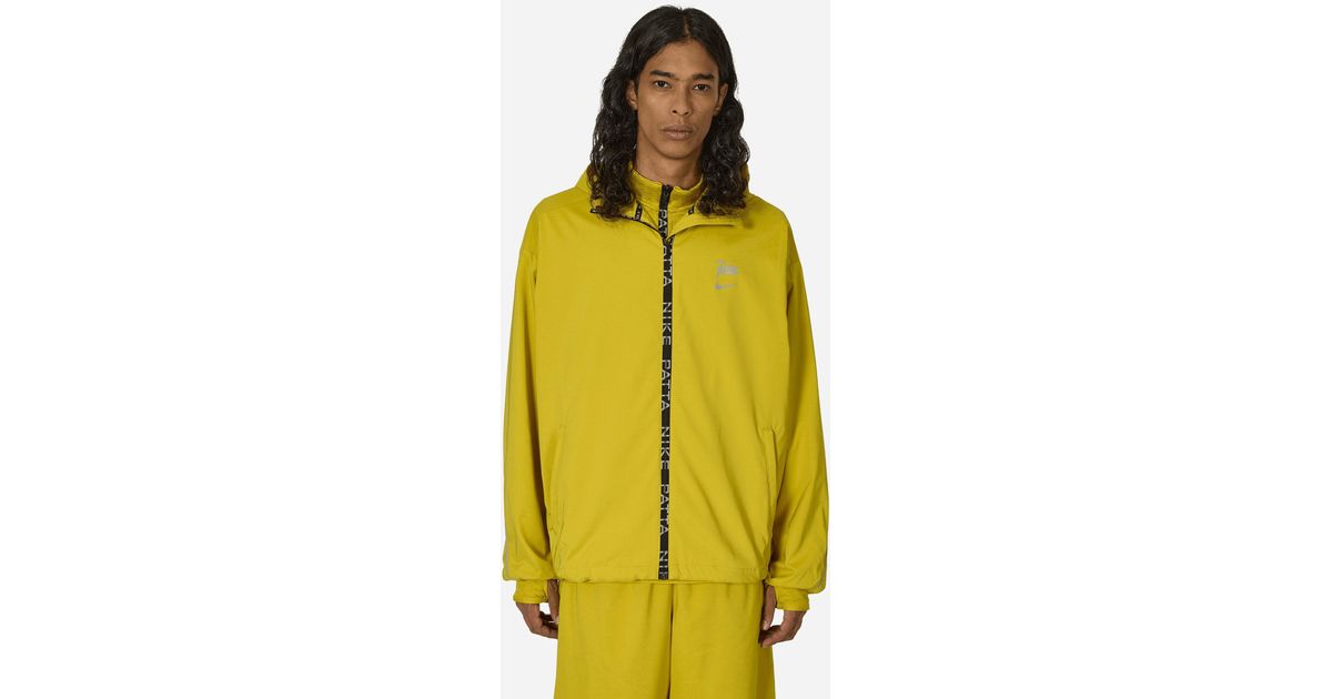 Nike Patta Running Team Hooded Track Jacket Saffron Quartz in Yellow ...