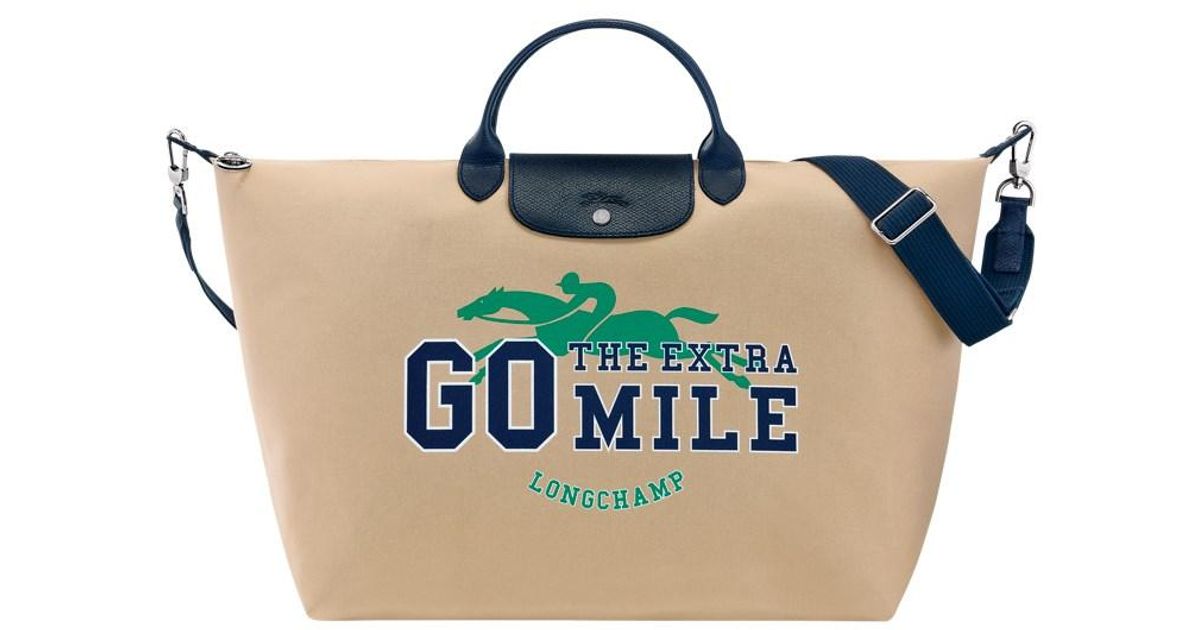 Longchamp `Le Pliage Team` Small Travel Bag in Blue | Lyst