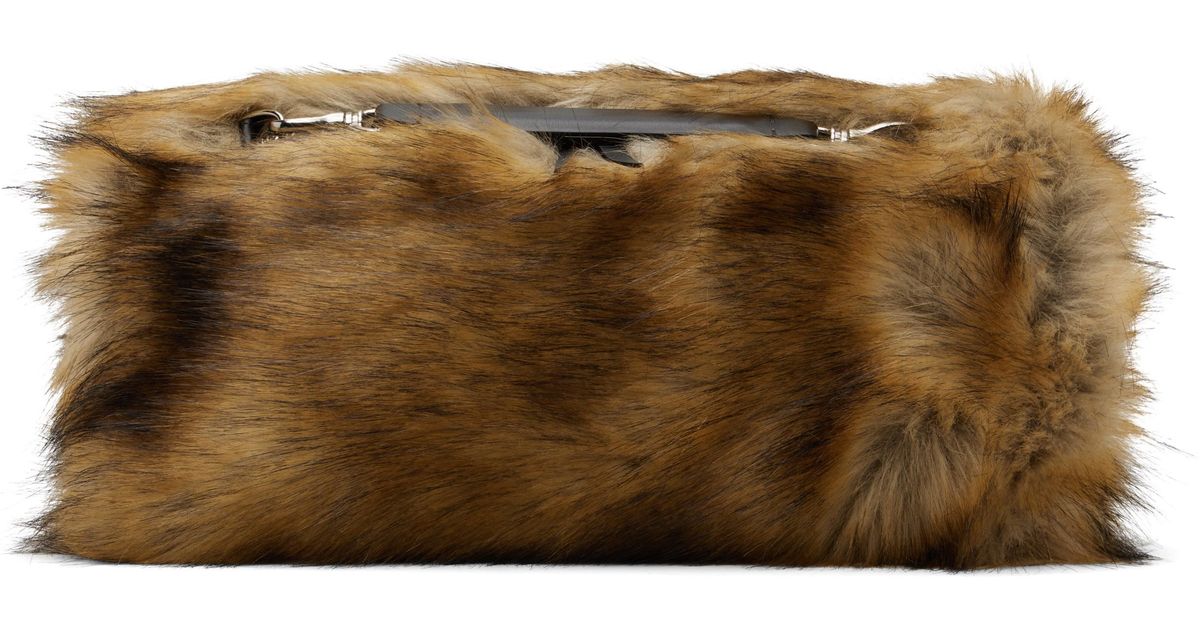 Toga Hand Faux-Fur Bag in Black | Lyst UK