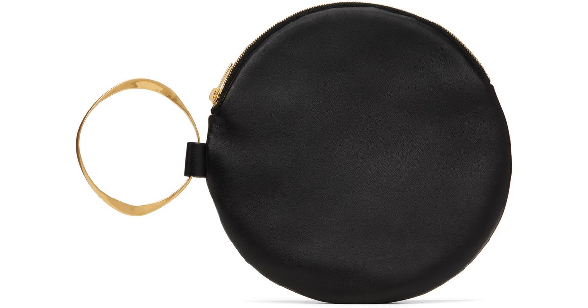 The Row Round Bracelet Clutch in Black | Lyst UK