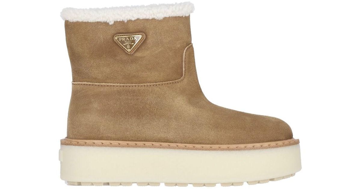 Prada Logo Shearling Boots in Natural | Lyst