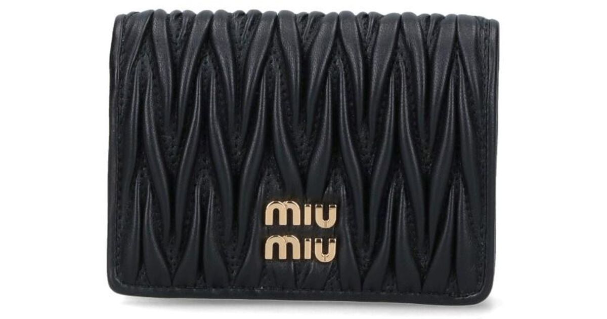 Miu Miu Matelassé Wallet in Black | Lyst UK
