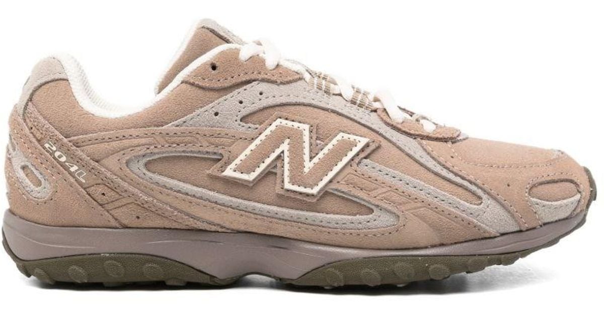 New Balance 204 Sneakers in Natural | Lyst UK