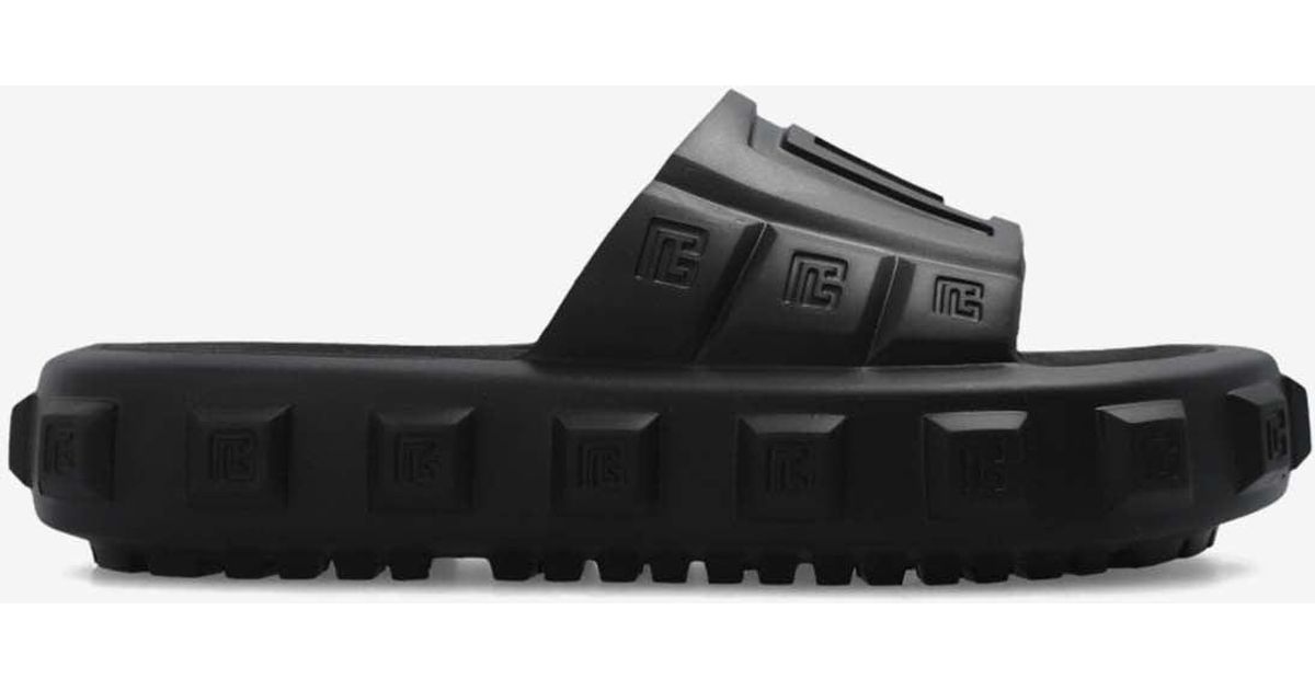 Balmain Ari Logo Embossed Slides in Black for Men | Lyst
