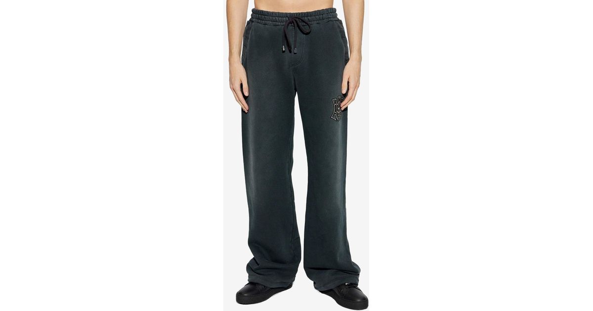 Amiri Logo Patch Washed Track Pants in Black for Men | Lyst