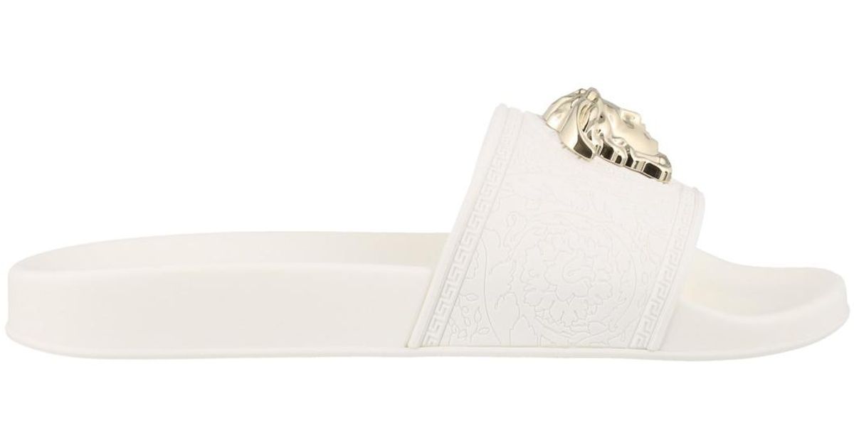 Versace Medusa Head Rubber Slides in Natural | Lyst