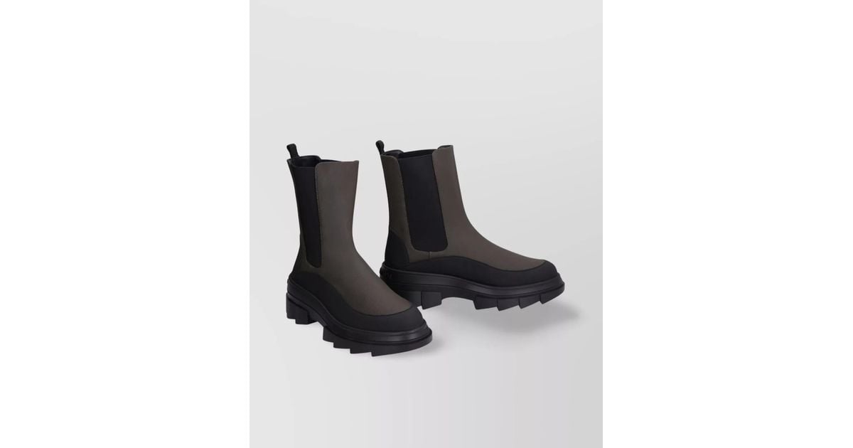 Stuart Weitzman Chelsea Boots With Lug Sole And Pull Tab in Black | Lyst